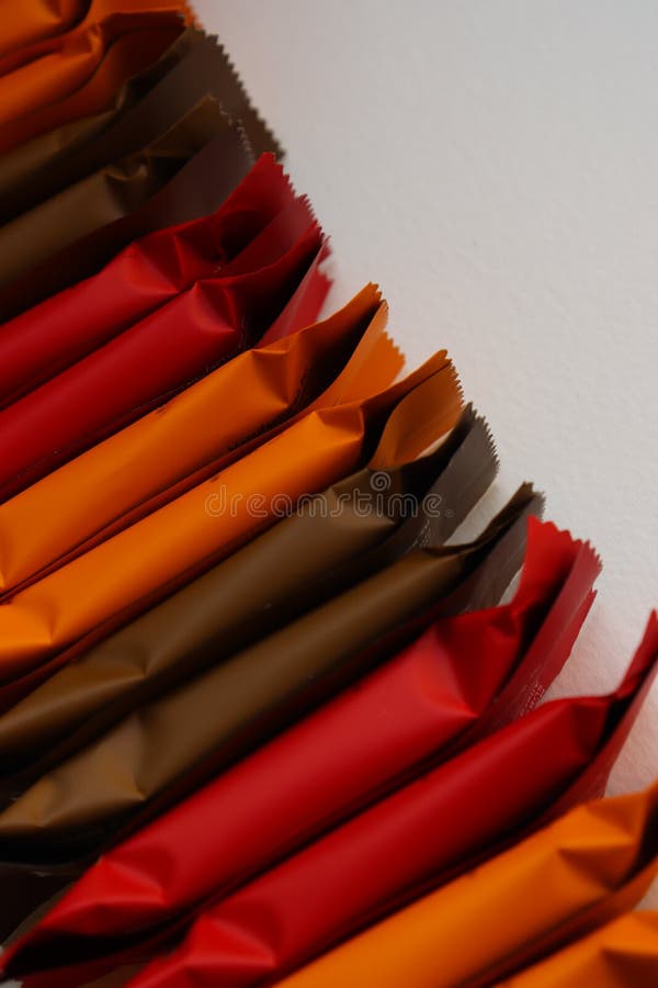 Chocolates White Background.Different Color Chocolate Package Stock ...