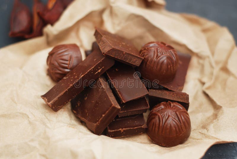 Chocolates Pieces Isolated on Craft Papper Background. Chocolate. Fine ...