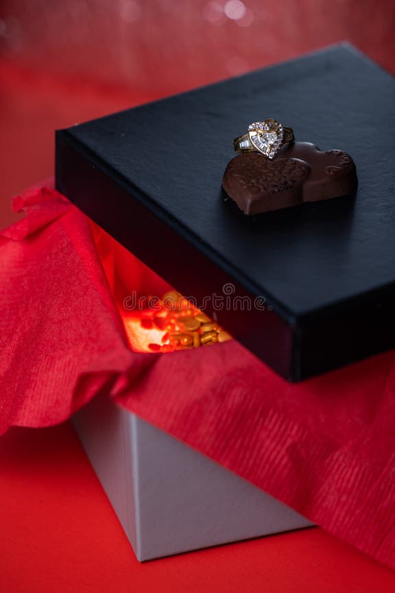 Chocolates and a ring stock photo. Image of milk, heart - 268859680