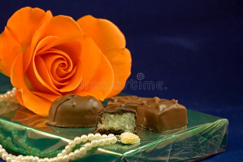Chocolates and rose stock image. Image of candy, romantic - 4018737