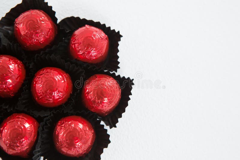 Wrapped Chocolate In A Paper Case Stock Photo - Image of paper, gourmet ...