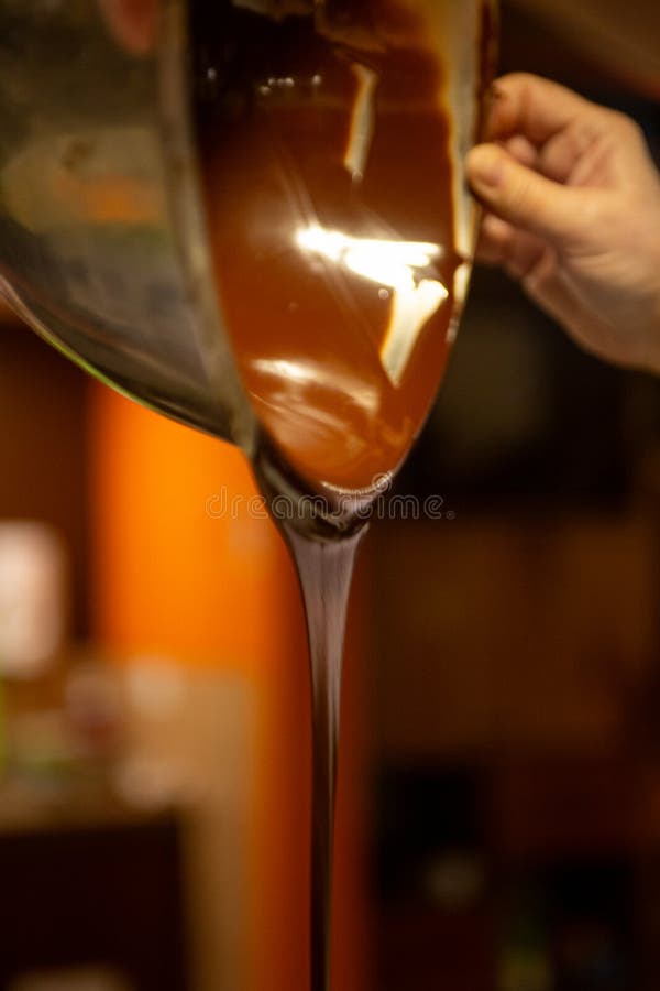 Chocolatier Pouring Chocolate Stock Photo - Image of teacher, treat ...