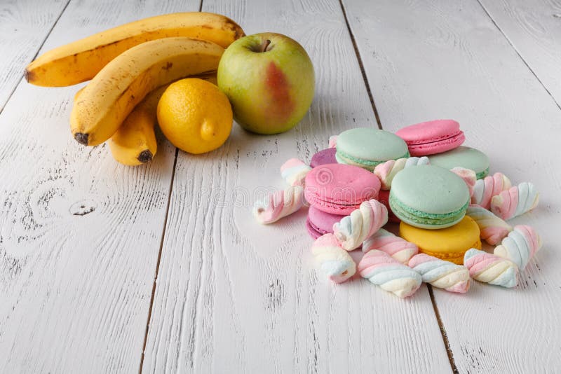 Choice fruits vs sweets stock photo. Image of fresh - 114643120