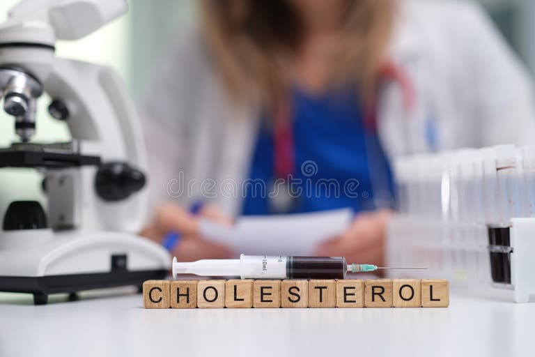 Cholesterol Testing in a Lab Using a Microscope and Test Tubes for ...