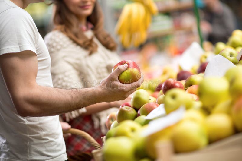 Choosing Apple in the Market Stock Photo - Image of healthy, fruit ...
