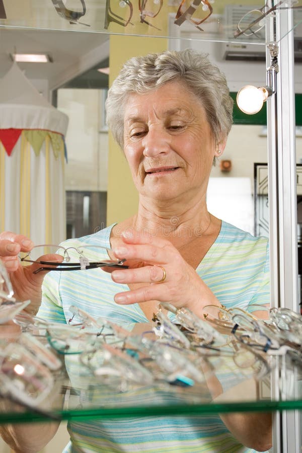 Choosing Glasses at the Optician Stock Image - Image of ophthalmic ...