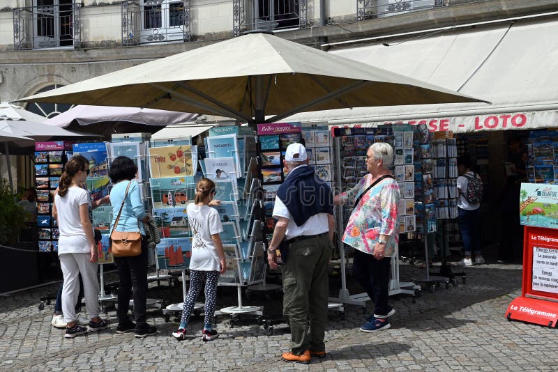 Choosing Postcards on Holiday in France Editorial Image - Image of ... Choosing Postcards on Holiday in France Editorial Image - Image of ...