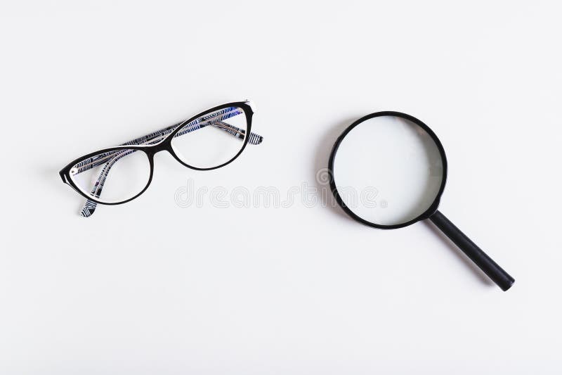 Choosing between Vision Glasses and a Magnifying Glass, Top View Stock ...
