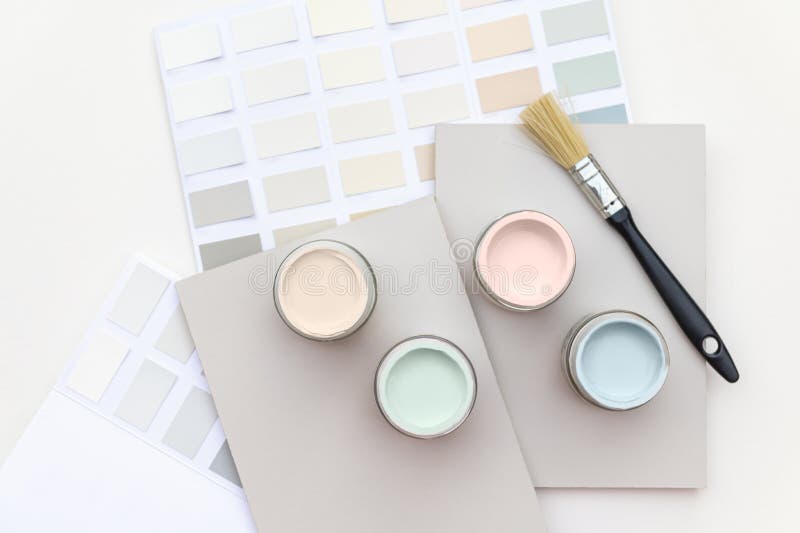 Choosing wall paints stock photo. Image of paintbrush - 242091240