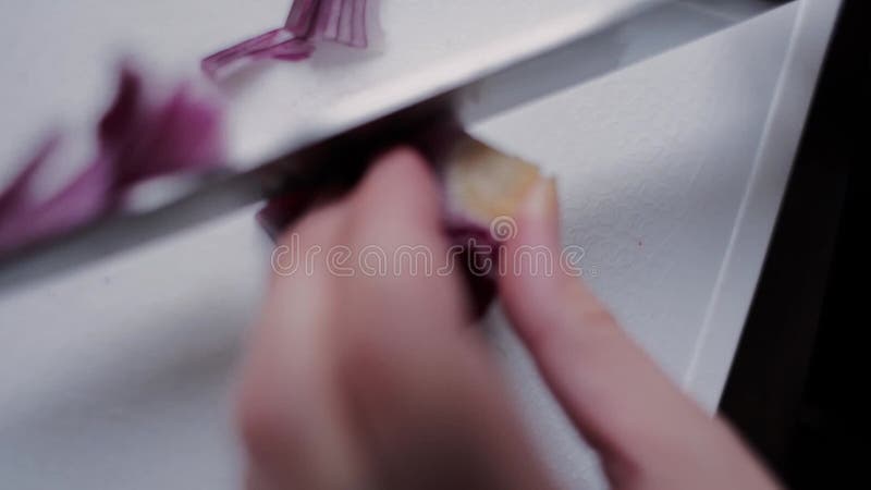 Chop the Red Onion on the Board on the Table Stock Footage - Video of ...