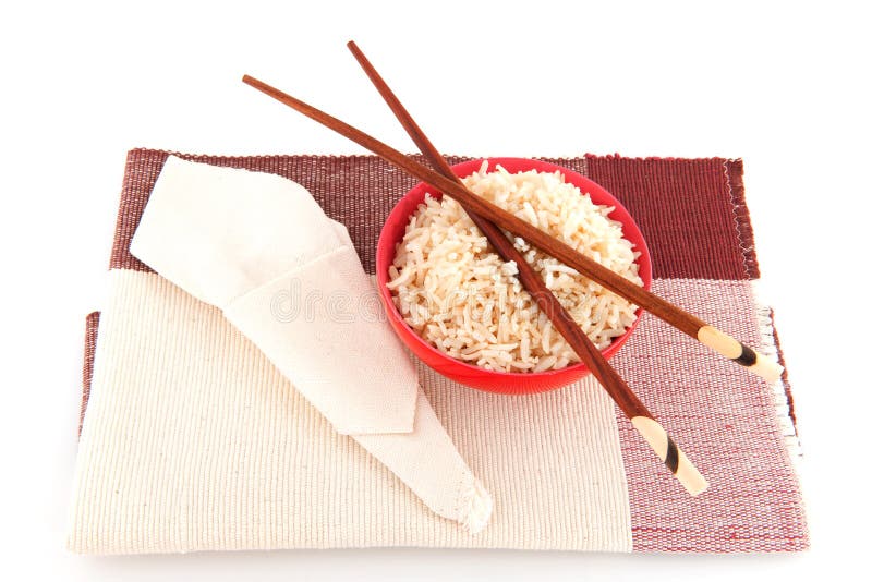 Chop Sticks and Rice in Brown Stock Image - Image of japanese, placemat ...