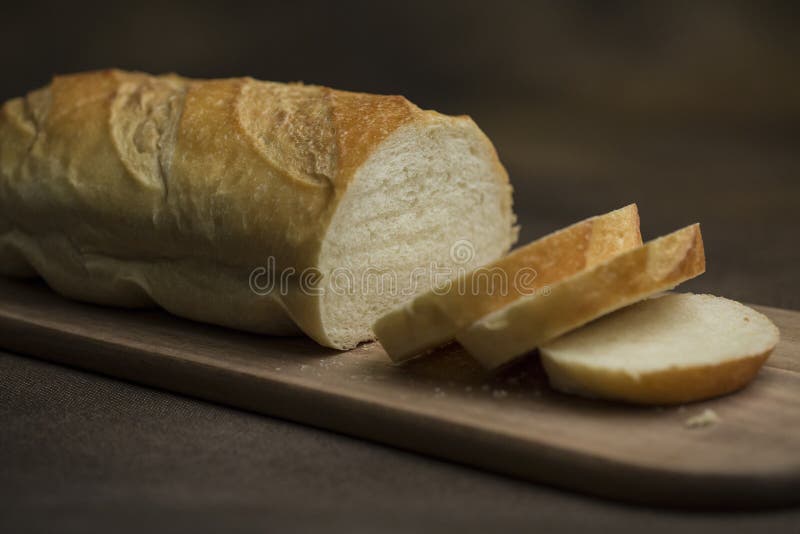 Chopped bread on platter stock photo. Image of cutting - 192156710