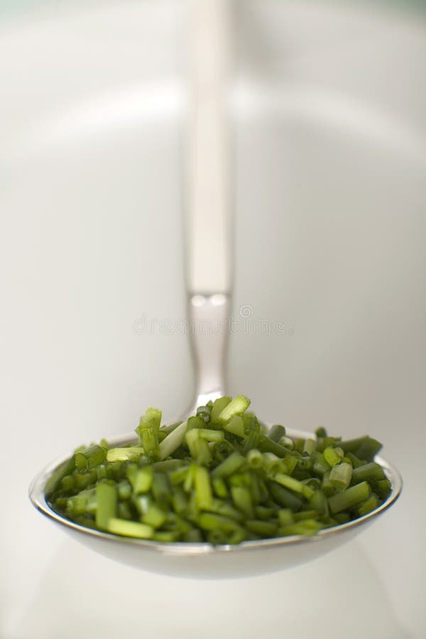 Chopped Chives in Spoon on Plate Close-up Stock Image - Image of spoon ...