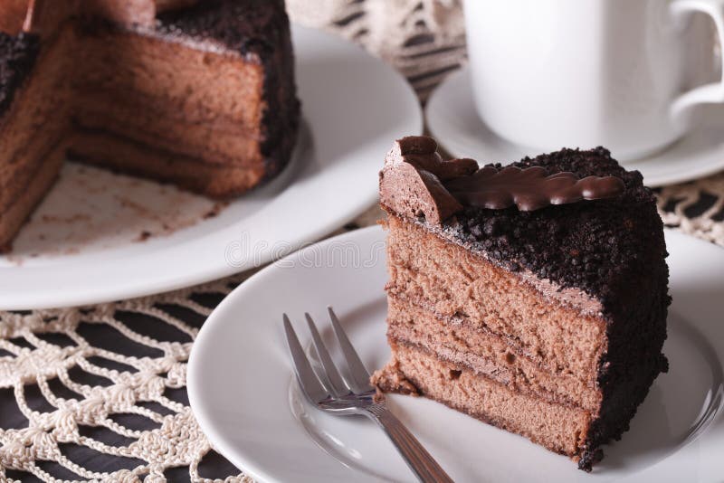 Chopped Chocolate Cake Close-up on a Plate. Horizontal Stock Photo ...
