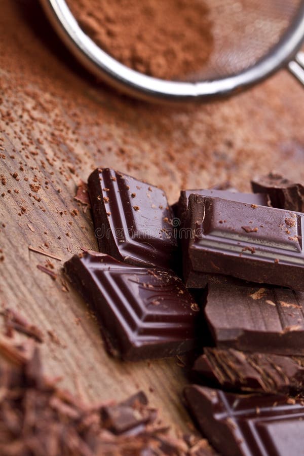 Chopped Dark Chocolate with Cocoa Stock Photo - Image of addiction ...