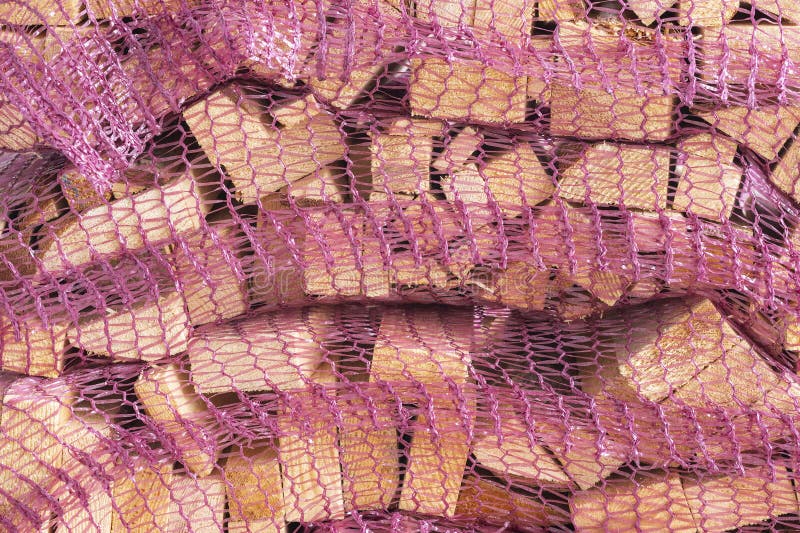 Chopped Firewood in a Net Ready for Fire Start in Fireplaces Stock ...