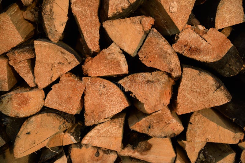 Chopped Firewood Stacked in Rows As Background Stock Photo - Image of ...