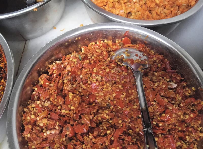 Chopped fresh red pepper stock image. Image of full, steel - 96074869