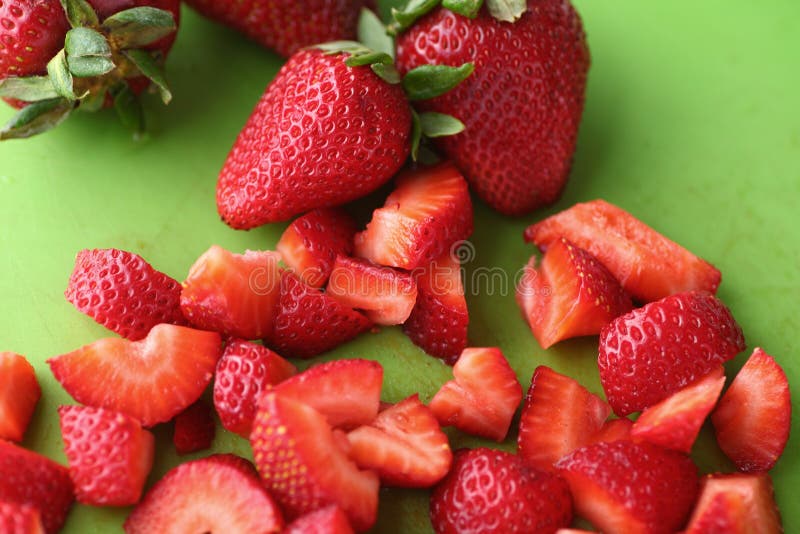 Chopped Fresh Strawberries on Cutting Board Stock Photo - Image of ...