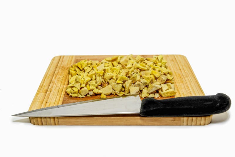 Chopped Ginger Root Cutting Block and Knife Top View Stock Photo ...