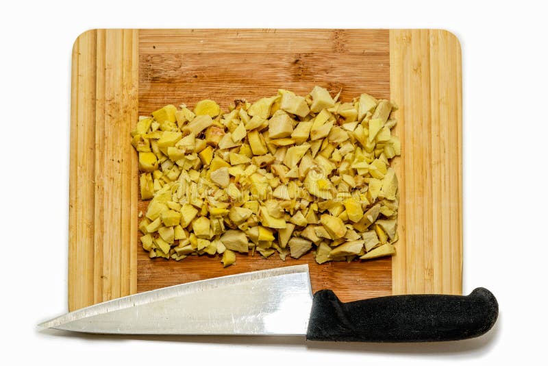 Chopped Ginger Root Cutting Block and Knife Top View Stock Photo ...