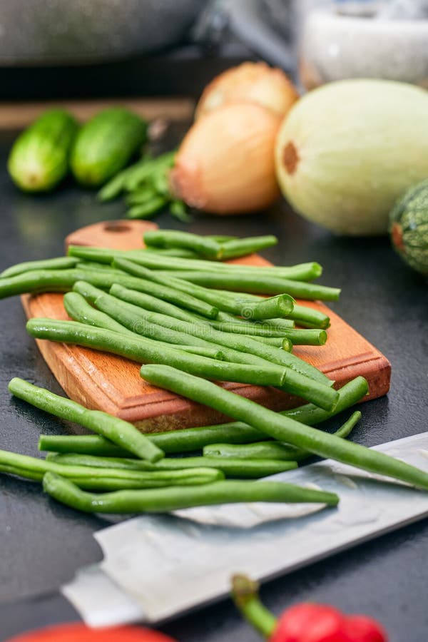 Chopped Green Beans on a Wood Board with Vegetables One Stock Image ...