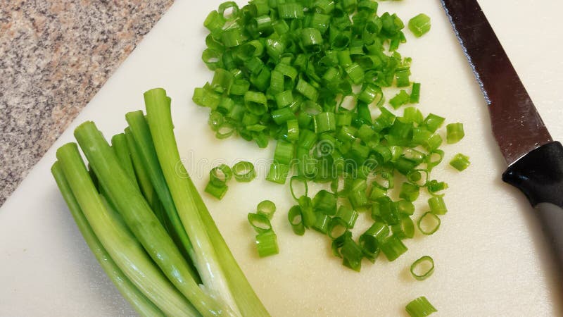 Chopped green onions stock photo. Image of knife, white - 72648654