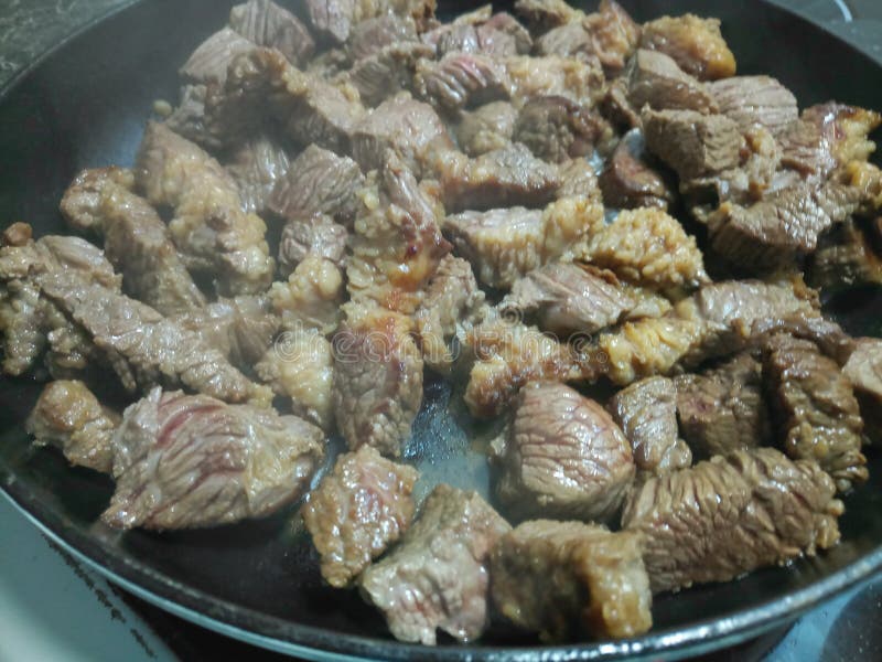 Chopped Meat Cooking in an Iron Cast Stock Photo - Image of meat ...