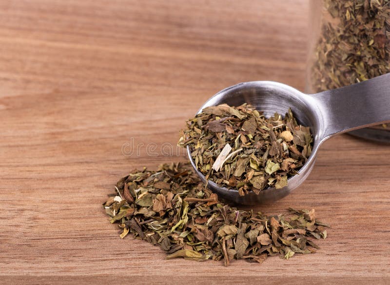 Chopped Mint on a Wooden Table Stock Image - Image of flakes, spoonful ...