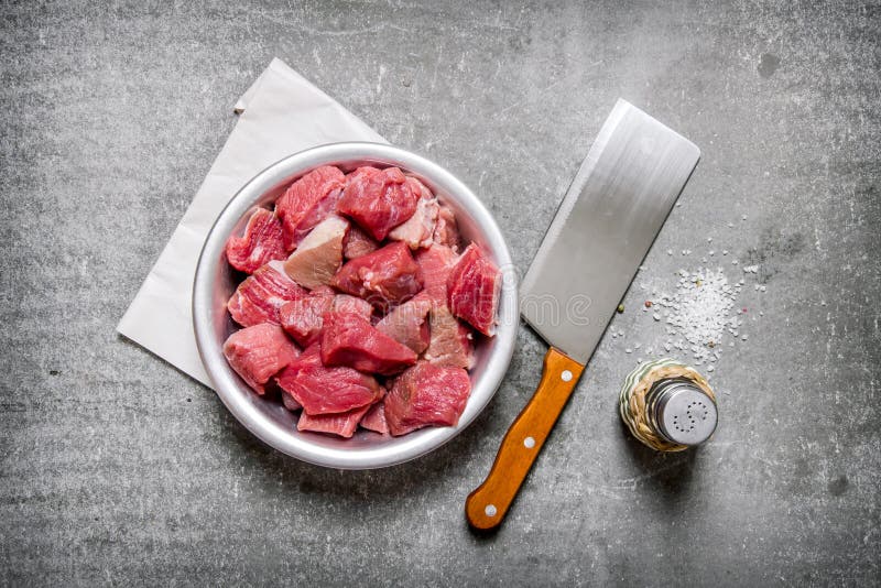 Chopped Raw Meat with a Butcher Knife and Salt. Stock Image - Image of ...