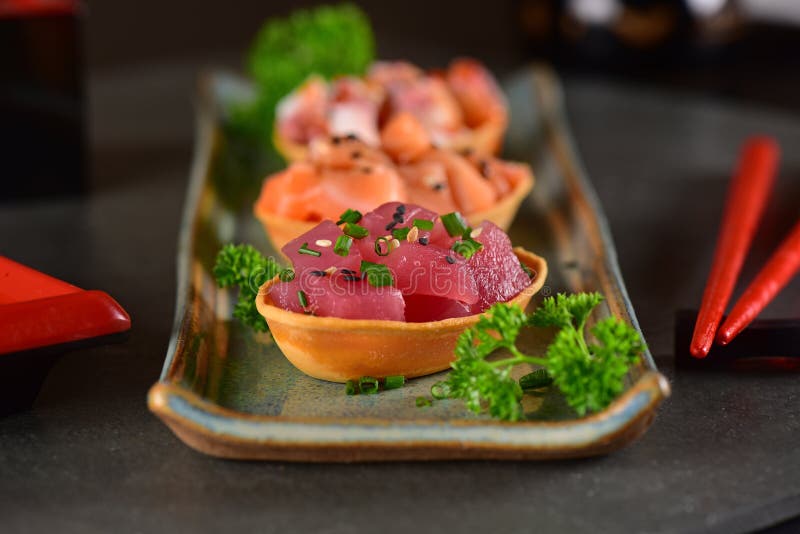 Canapes on rustic plate stock photo. Image of culture - 127155338