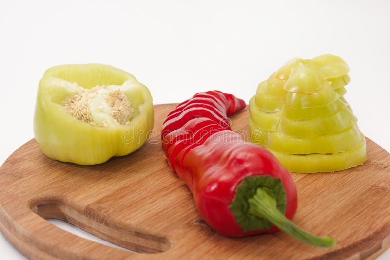 Chopped Red and Green Paprika on a Kitchen Wooden Board Stock Image ...