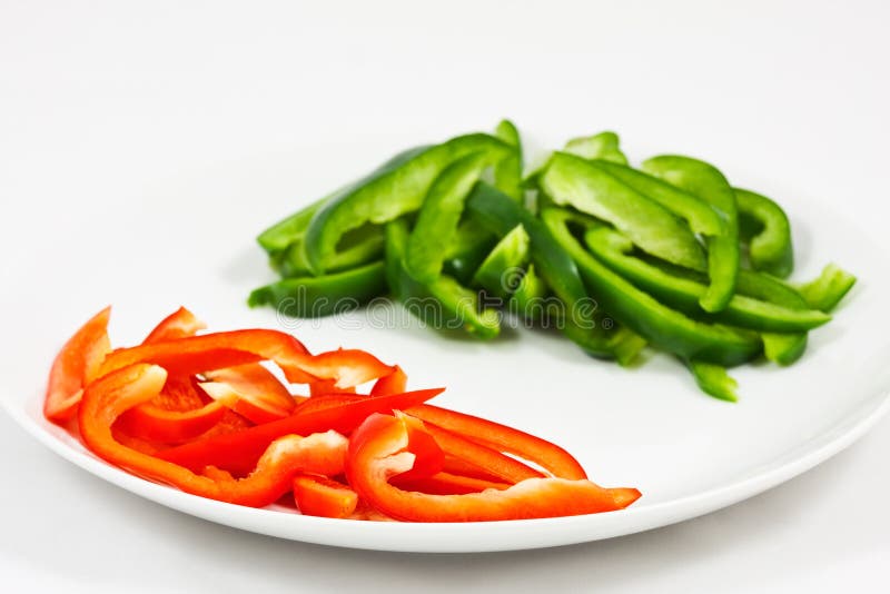 Chopped Red and Green Peppers on White Stock Photo - Image of green ...