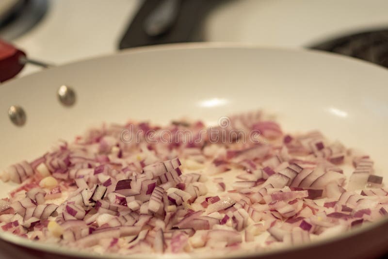 Chopped Red Onion in Pan stock photo. Image of dinner - 115750514