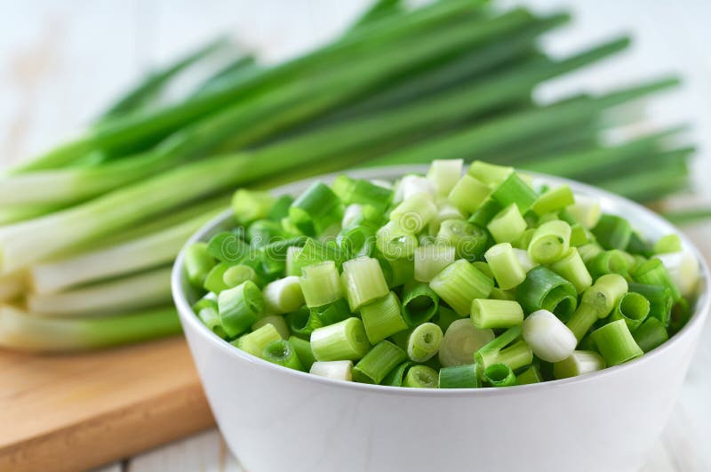 Chopped Scallions or Young Spring Onion in a Ceramic Bowl , on a ...