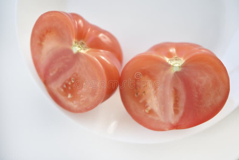 Chopped Tomato on a White Plate. Tomato Salad. Sliced Vegetables Stock ...