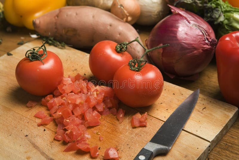 Chopped tomatoes stock image. Image of knife, eating, chopped - 1812469