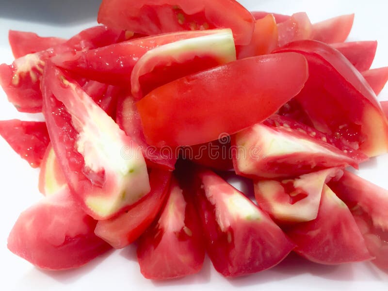 Chopped Tomatoes stock photo. Image of handful, tomatoes - 58282318