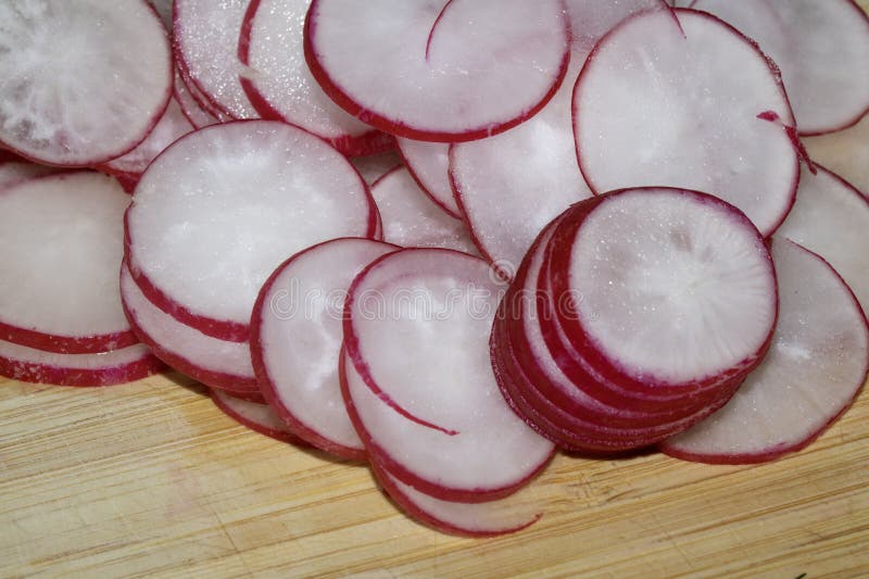 Chopped Up Sliced Radish on a Chopping Board in a Kitchen Stock Image ...
