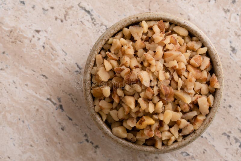 Chopped Walnuts in a Bowl stock photo. Image of chopped - 240094214