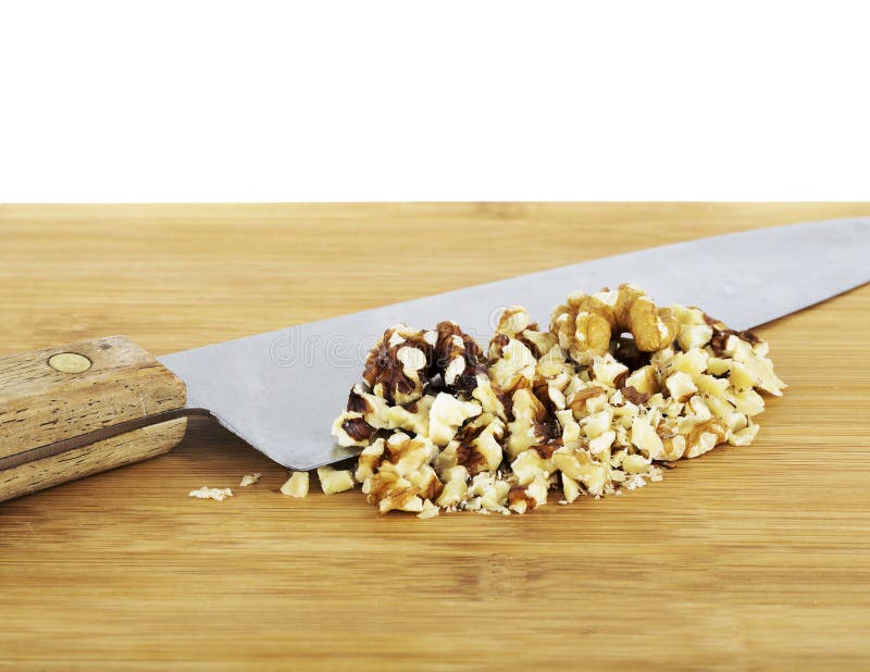 Chopped Walnuts with a Chefs Knife Stock Photo - Image of white ...