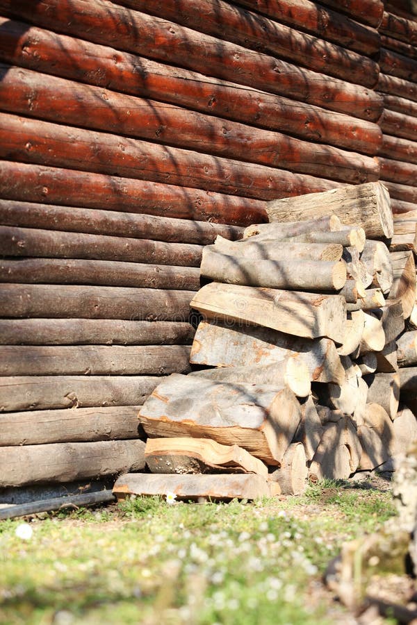Chopped Wood Next To the Log Cabin Stock Photo - Image of wood, iron ...