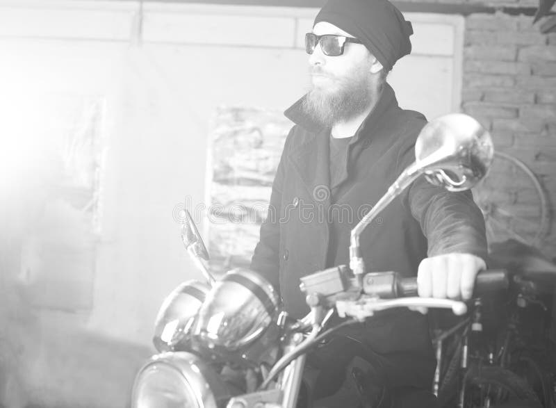 Chopper with its driver stock image. Image of motorcycle - 51256101