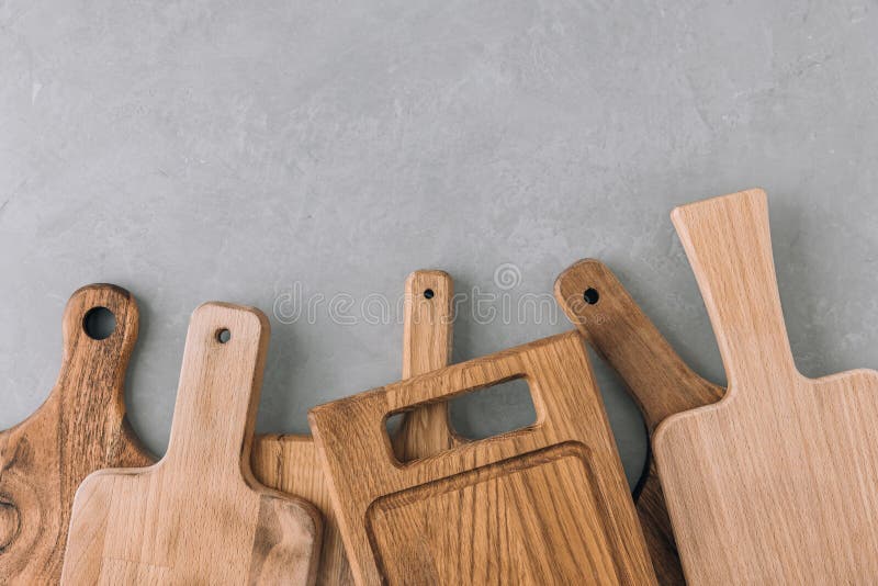 Wooden Chopping Board on Dark Stone Background, Top View Stock Image ...