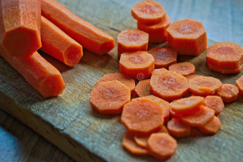 Chopping Carrots stock photo. Image of board, cutting - 79587130