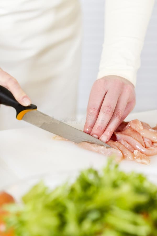 Chopping Chicken Fillet stock photo. Image of hand, person - 29639204
