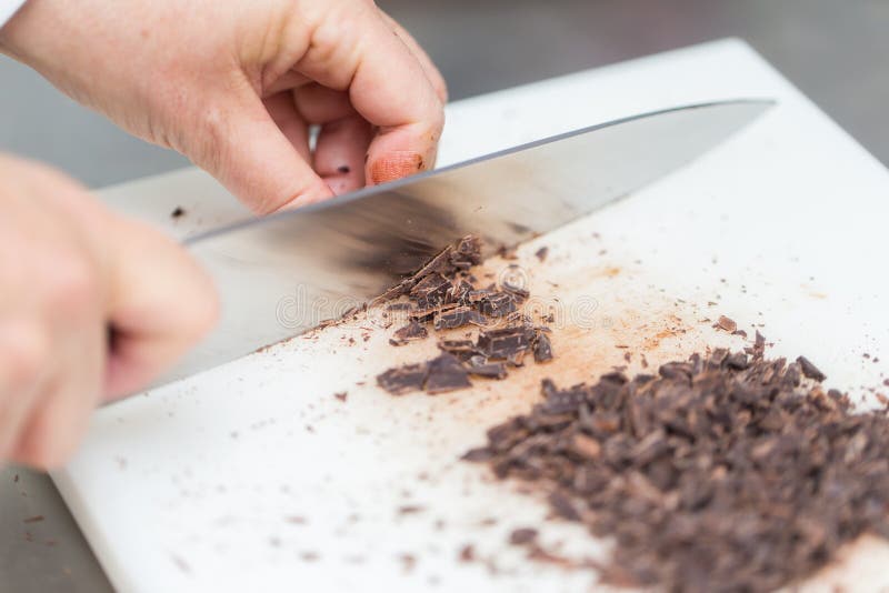 Chopping chocolate stock image. Image of closeup, food - 67643151
