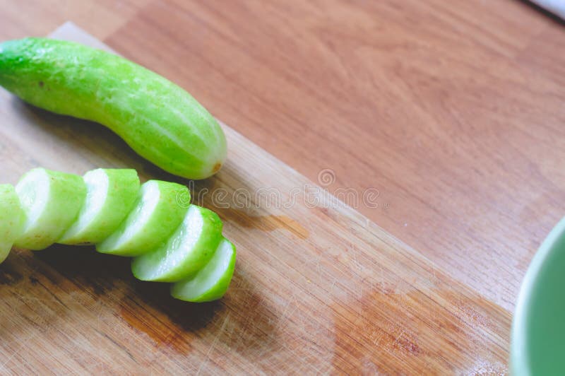 Chopping Cucumber stock photo. Image of fresh, nutrition - 75057668