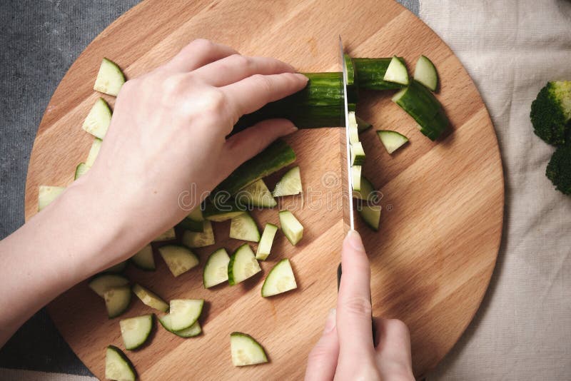 Chopping a Cucumber on a Cutting Board Stock Image - Image of cucumber ...