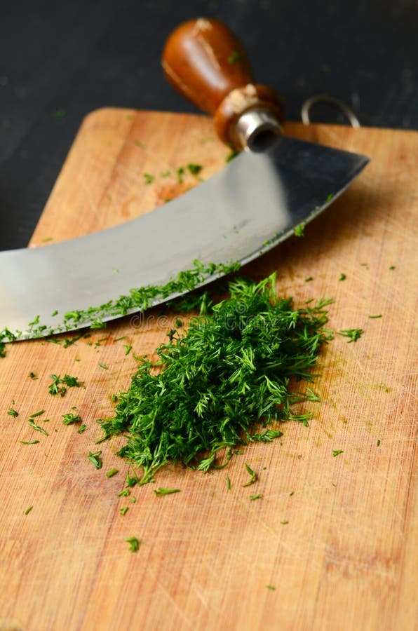 Chopping fresh dill stock image. Image of natural, preparation - 64021149